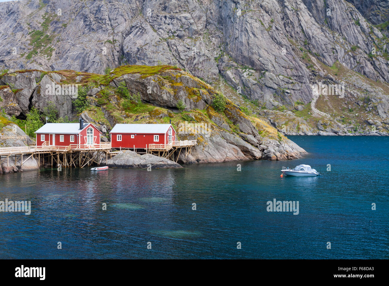 Typical red rorbu fishing hut in town of Svolvaer on Lofoten islands in ...