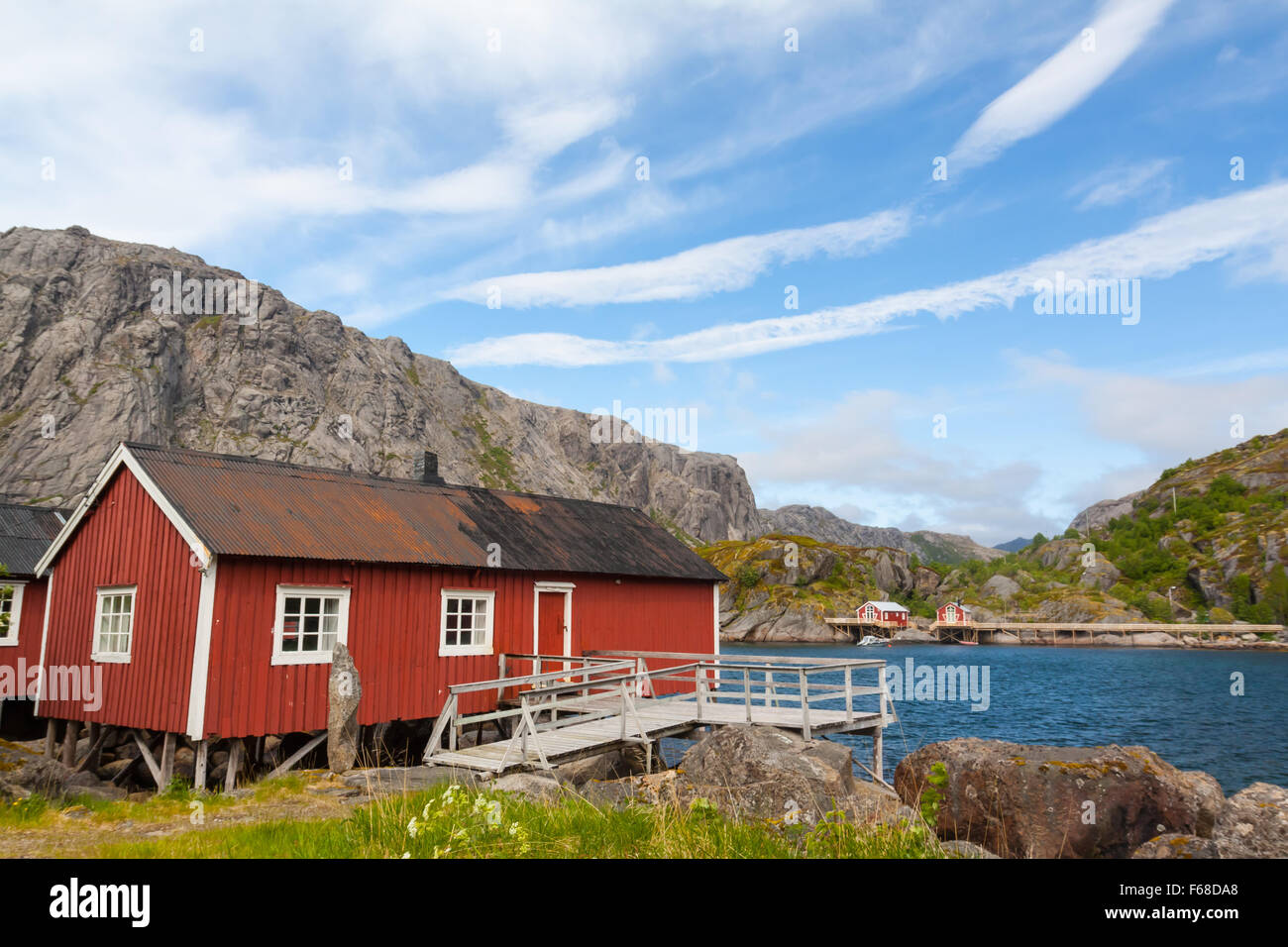 Typical red rorbu fishing hut in town of Svolvaer on Lofoten islands in ...
