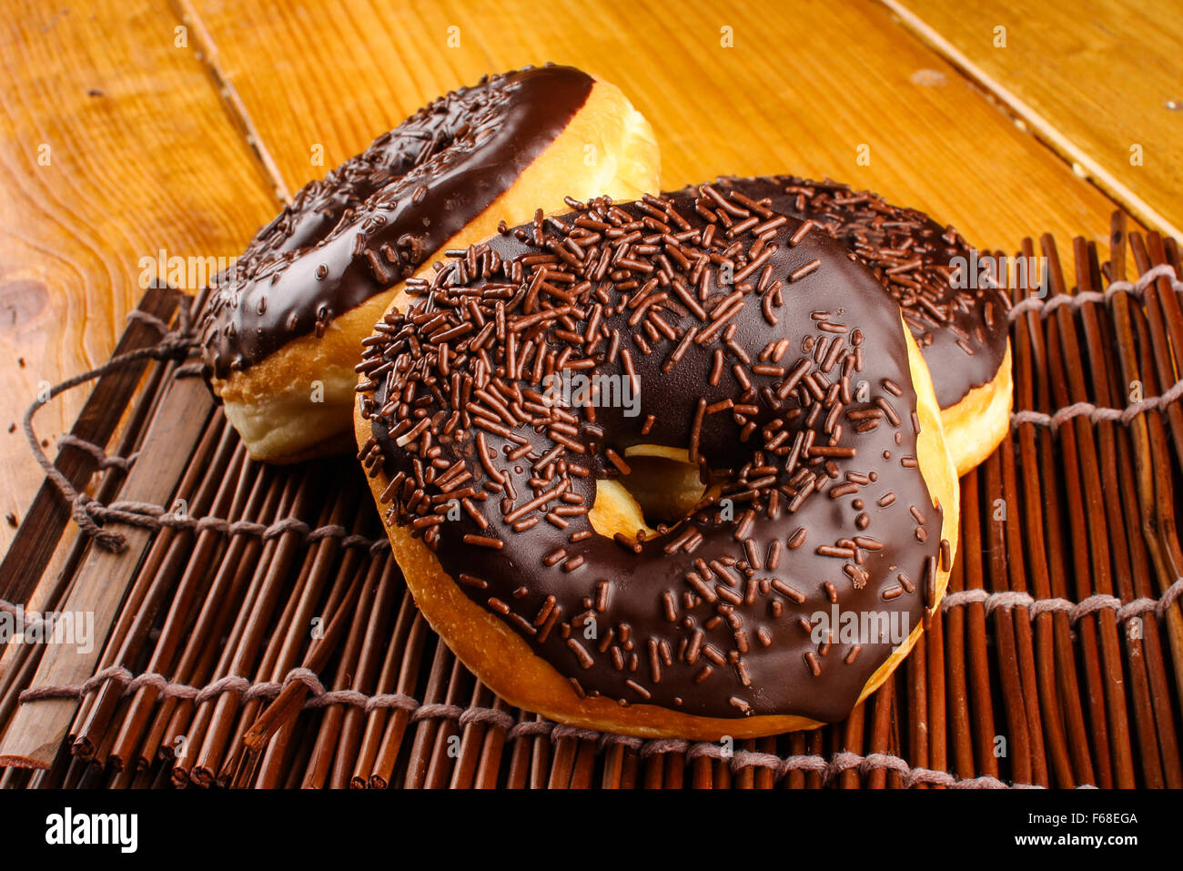 concept of chocholate doughnuts with wood palet background Stock Photo ...