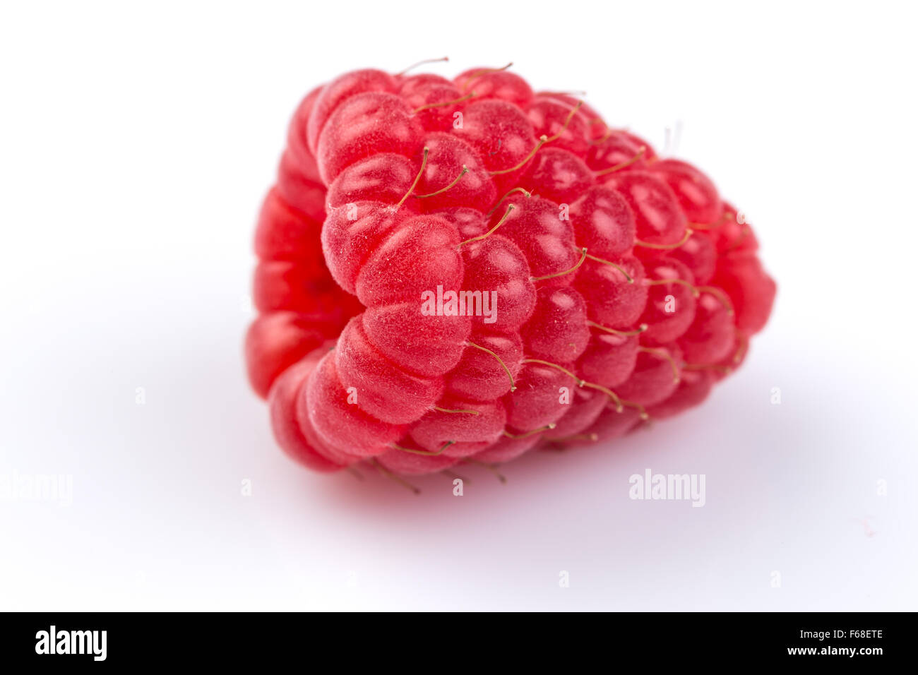 Fresh raspberry isolated on a white background Stock Photo - Alamy