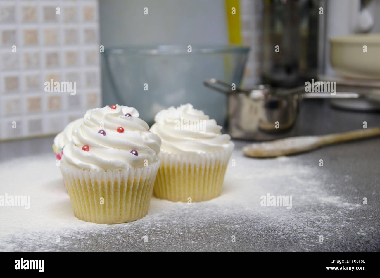 3 Homemade Home Baked Cupcakes in Kitchen Setting Stock Photo - Alamy