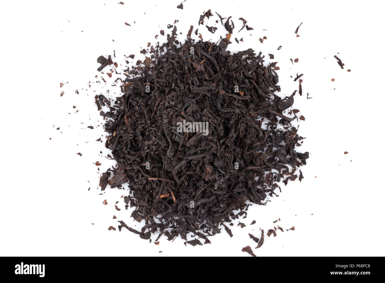 dry black tea leaves isolated on white Stock Photo - Alamy