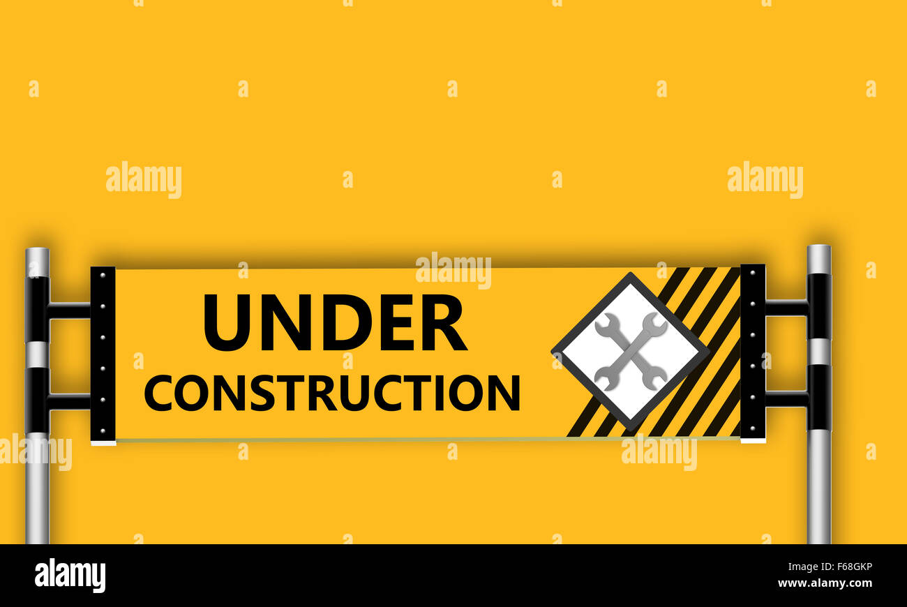 Yellow under construction sign warning hi-res stock photography and ...