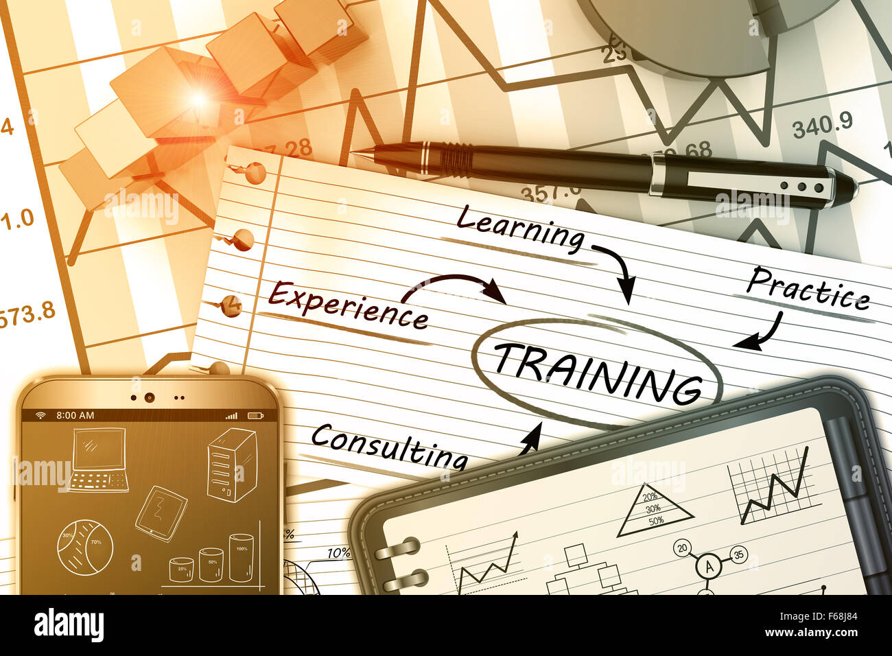 Business training, handwritten in a notebook on the table as concept ...