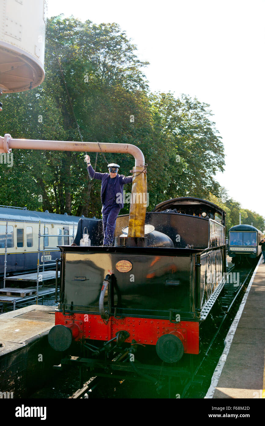 Locomotive 7827 'Lydham Manor' taking water at Paignton station on the ...
