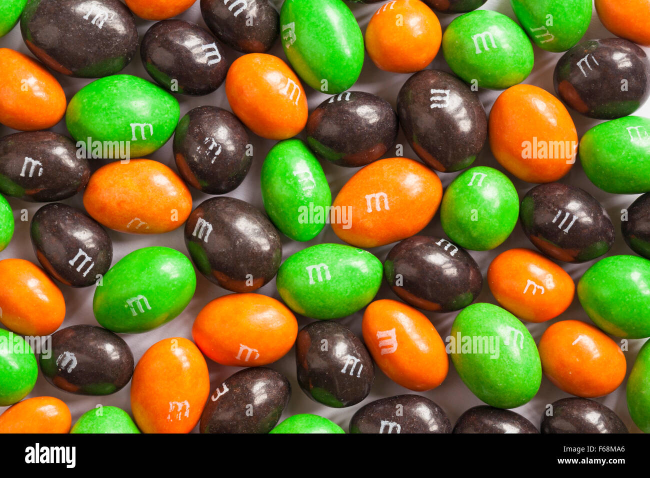 peanut M&Ms spooky colours for Halloween spread out Stock Photo - Alamy