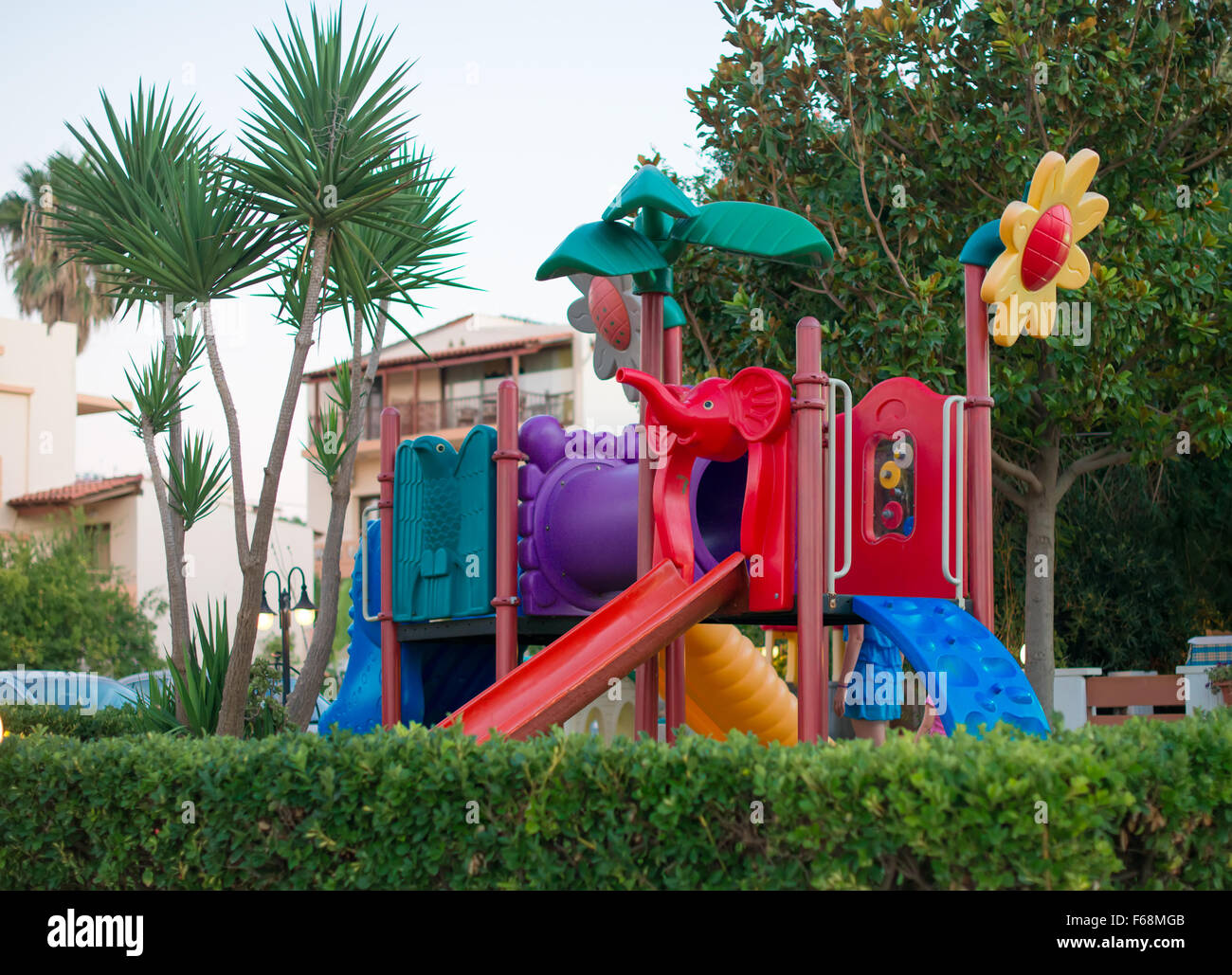 Colorful playground with slide Stock Photo - Alamy