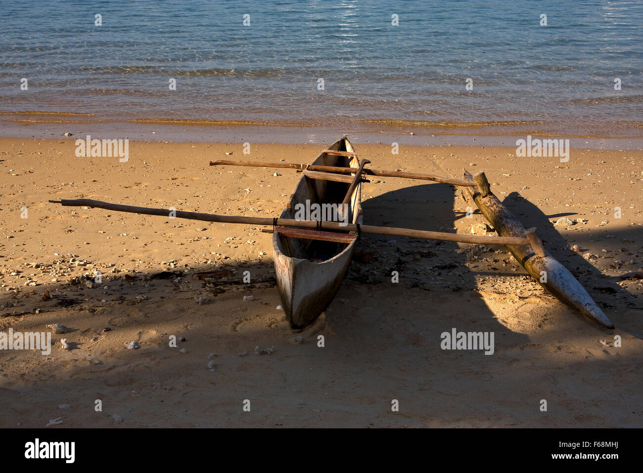 nosy be madagascar boat oar lagoon and coastline Stock Photo - Alamy