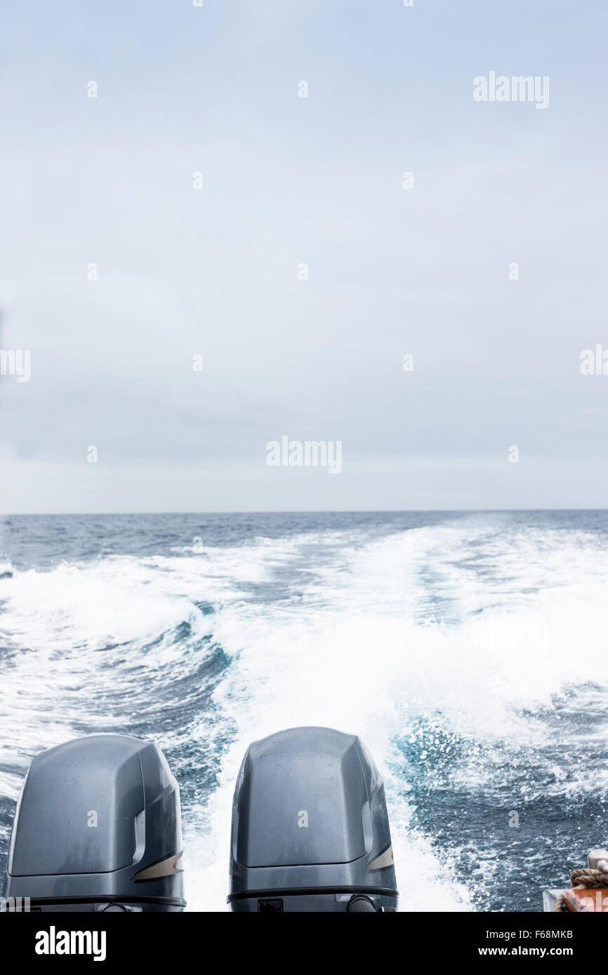 Twin engines on the back of a boat displaying power and speed Stock ...