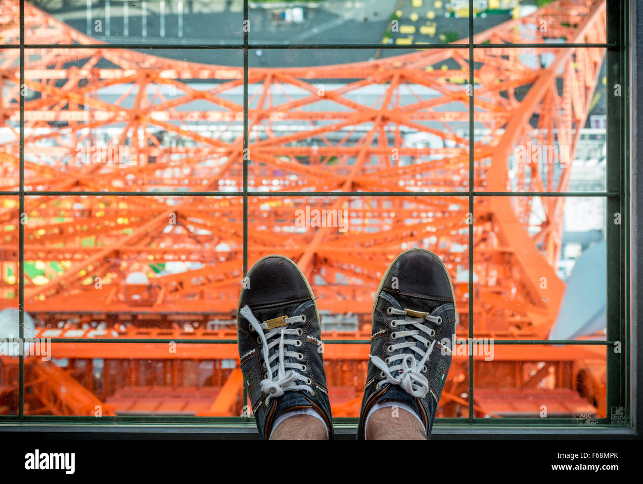 Floor window in the Tokyo Tower Stock Photo - Alamy