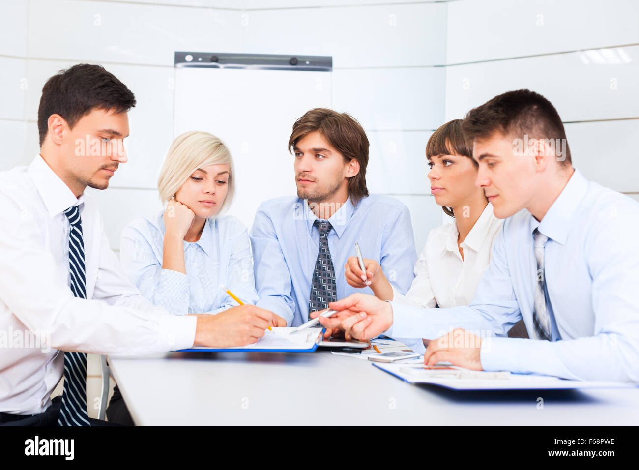 Office briefing serious hi-res stock photography and images - Alamy