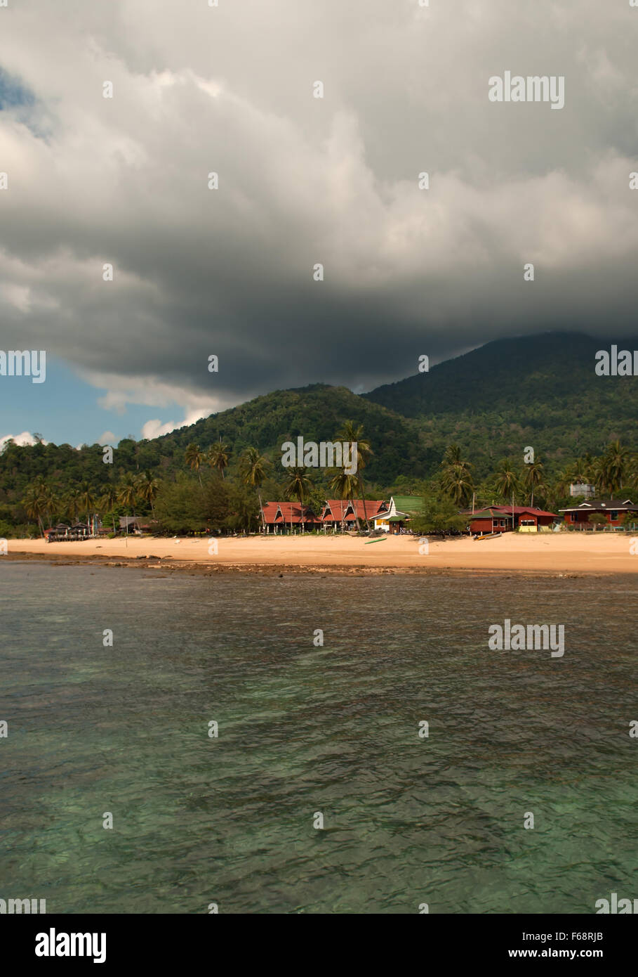 Malaysia,Tioman Island in summer.View from ocean on the beach and homes ...