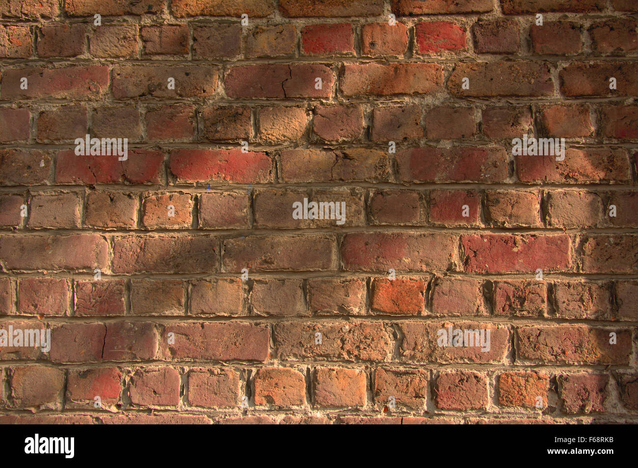brick wall with sun and shadow background Stock Photo - Alamy