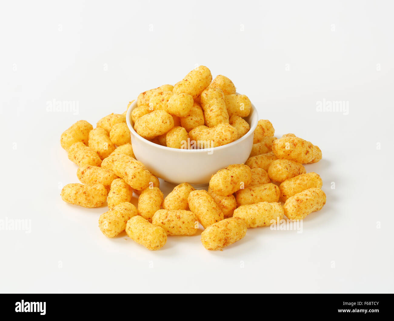 bowl of peanut crisps on white background Stock Photo - Alamy