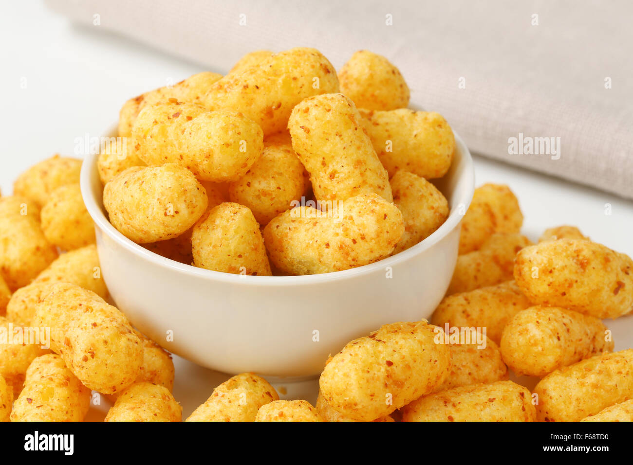 detail of peanut crisps in white bowl Stock Photo - Alamy
