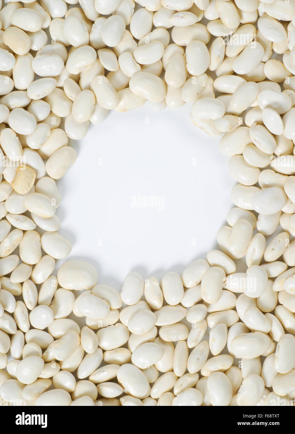 raw white beans and empty circle in the middle Stock Photo - Alamy