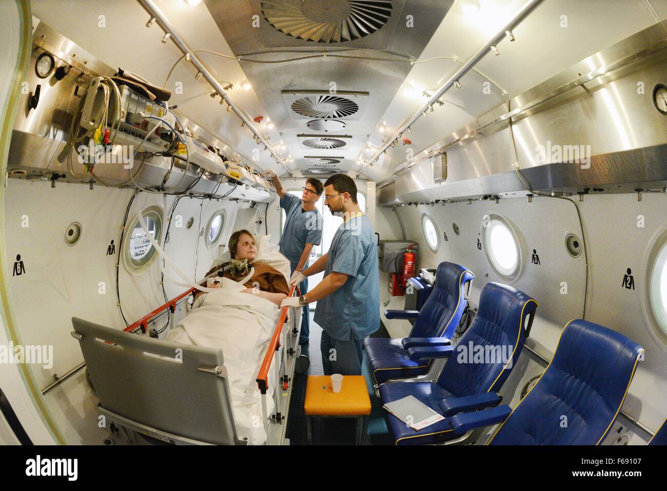 Anaesthetist Carsten Pohl (R) and hospital aide Rene Kriesel prepare a ...