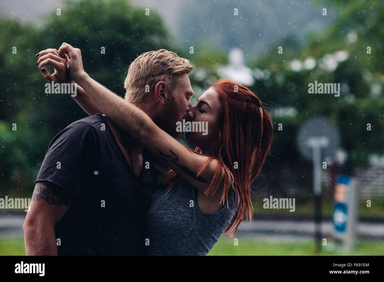 Romantic Kiss In The Rain