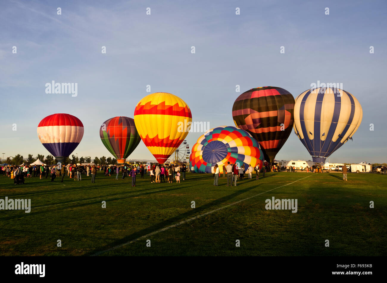 6 tethered balloons getting ready to ascend hi-res stock photography ...