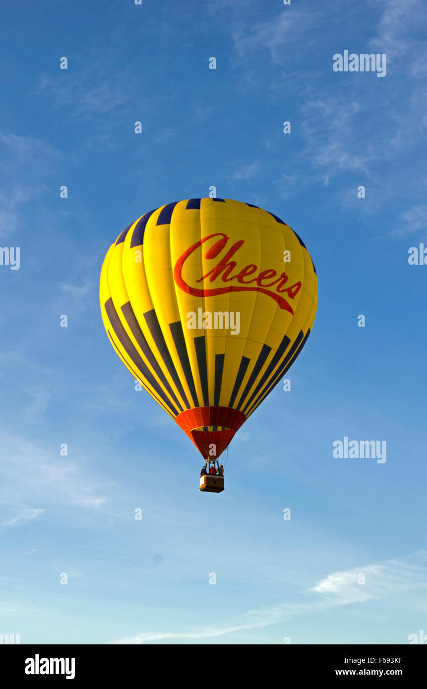 A single balloon floats away, Cheers on side Stock Photo - Alamy