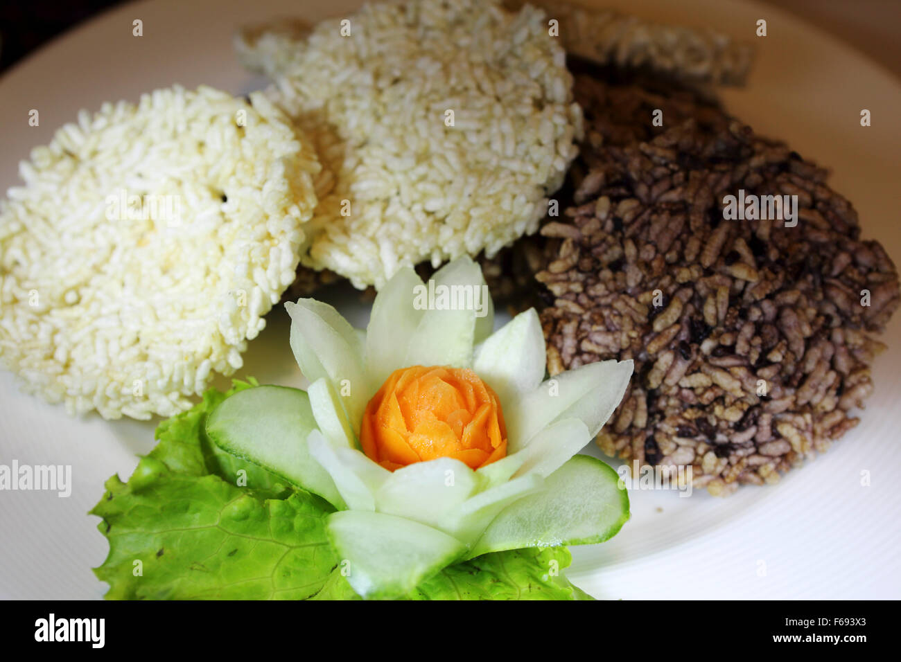 A Burmese rice cakes, served as a starter in a restaurant in Yangon ...