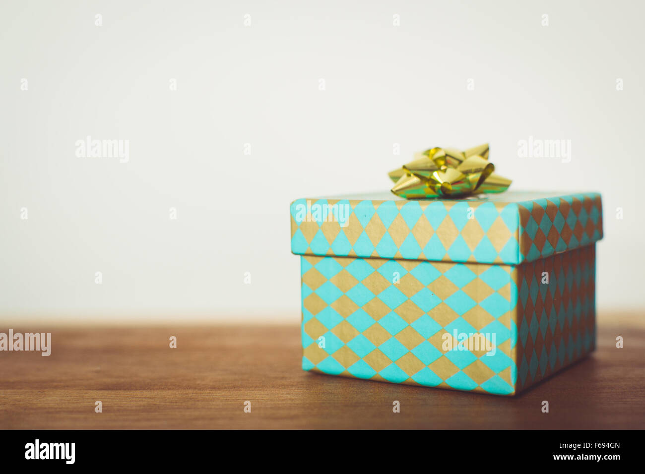 Christmas blue and gold gift box Stock Photo - Alamy
