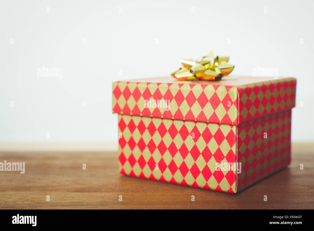 Christmas red and gold gift box Stock Photo - Alamy