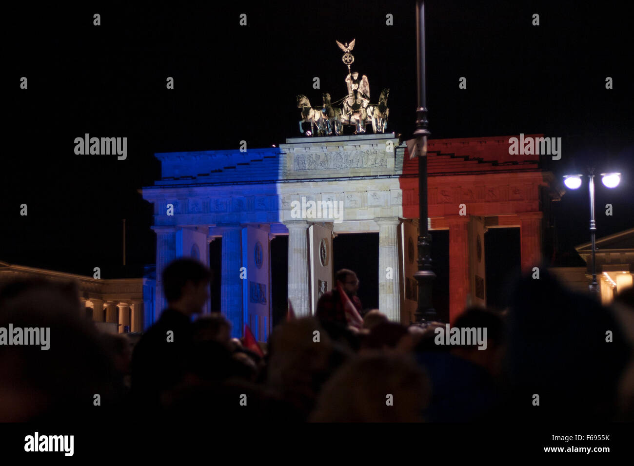 Berlin citizens and tourists gather at French embassy in Berlin to ...