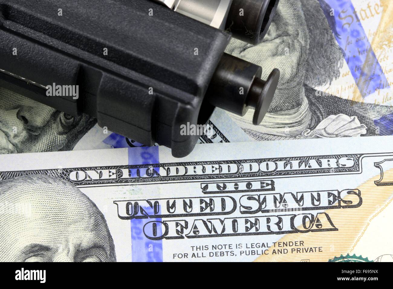 Weapons and Money Stock Photo - Alamy