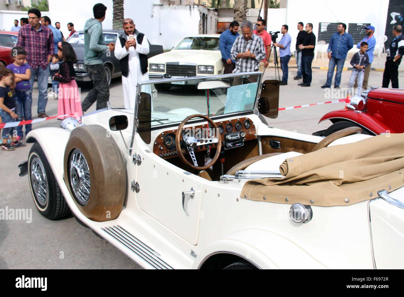Tripoli, Libya. 14th Nov, 2015. Some Libyans watch vintage cars in a ...