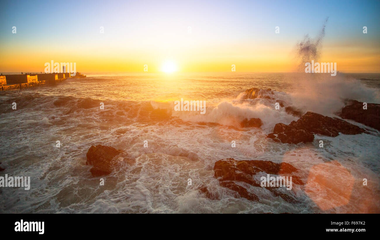 Ocean surf on a beach during an amazing sunset Stock Photo - Alamy