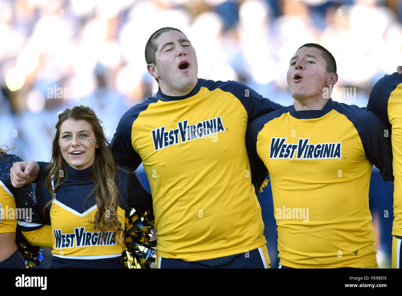 Morgantown, West VIrginia, USA. 14th Nov, 2015. WVU cheerleaders sing ...