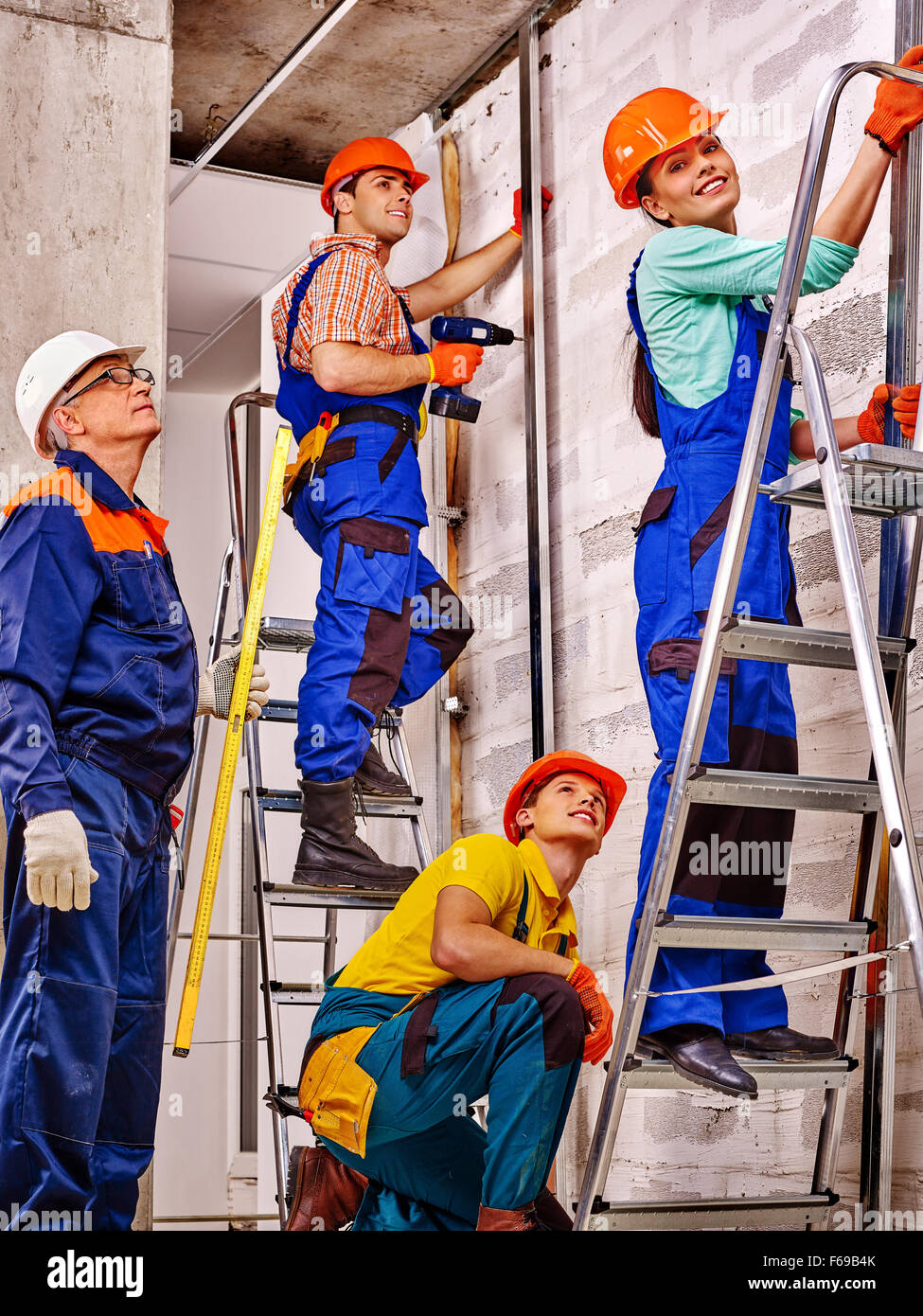 Group people in builder uniform Stock Photo - Alamy