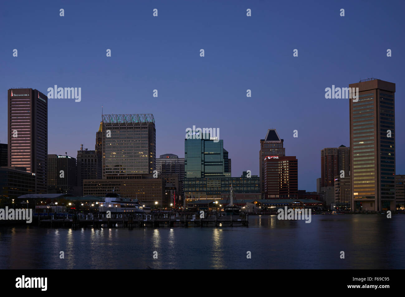 Baltimore city skyline with the harbor at dusk Stock Photo - Alamy