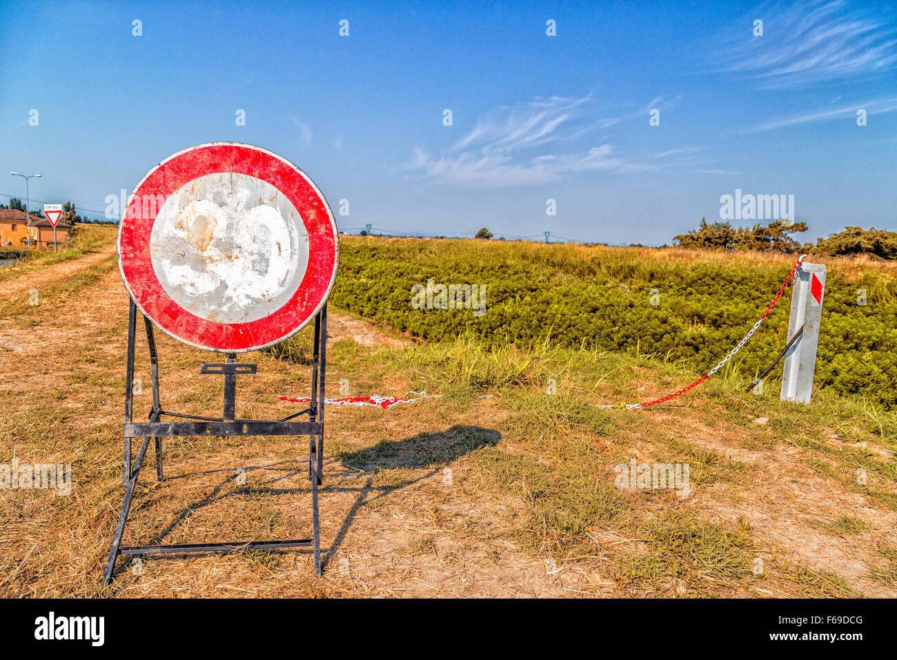 traffic signs and country roads - a faded speed limit 30 mph sign ...