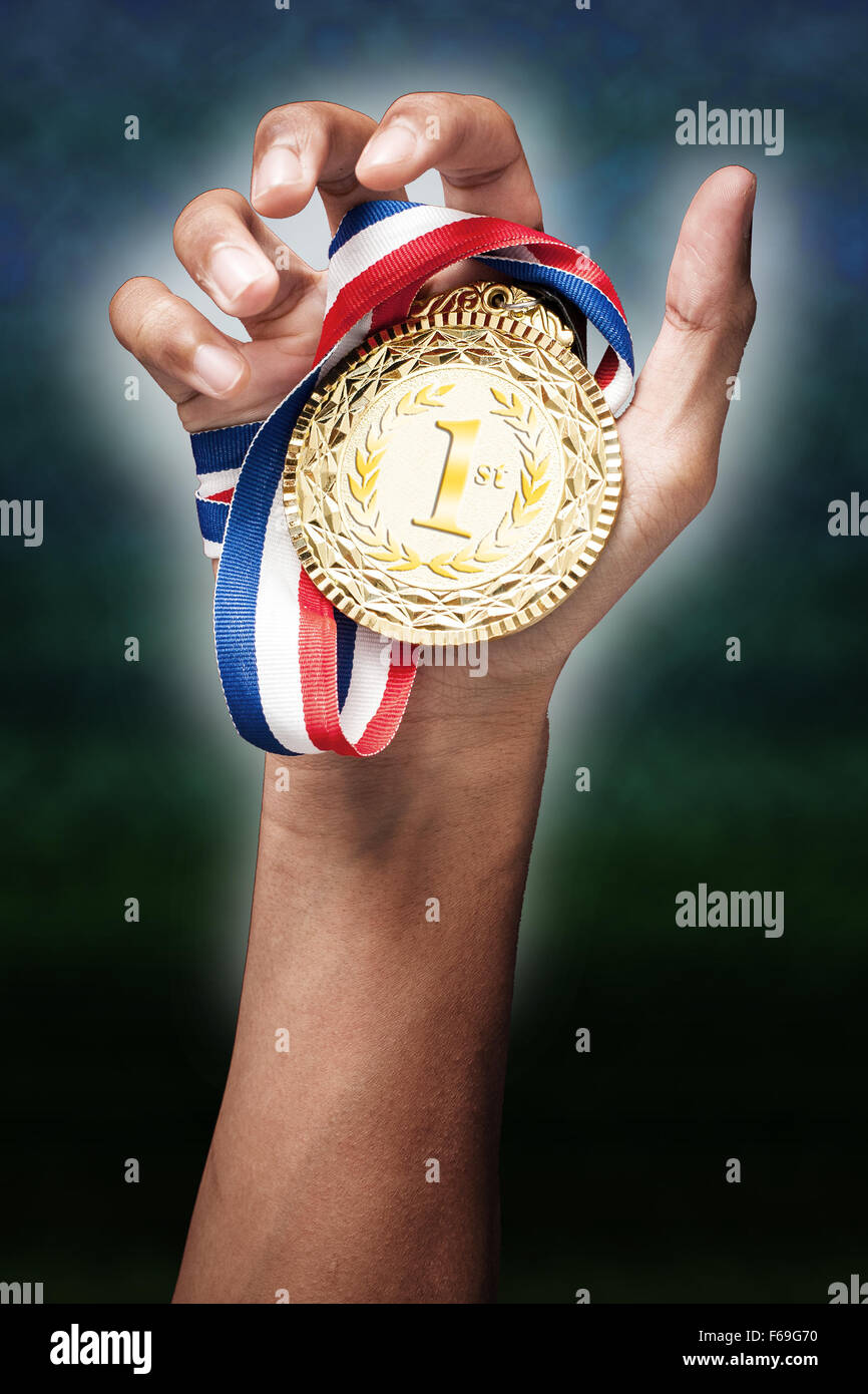 Holding medal hi-res stock photography and images - Alamy