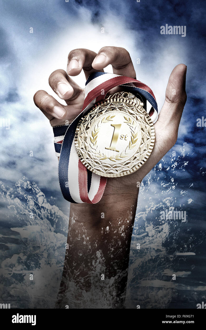 Winner holding medal hi-res stock photography and images - Alamy