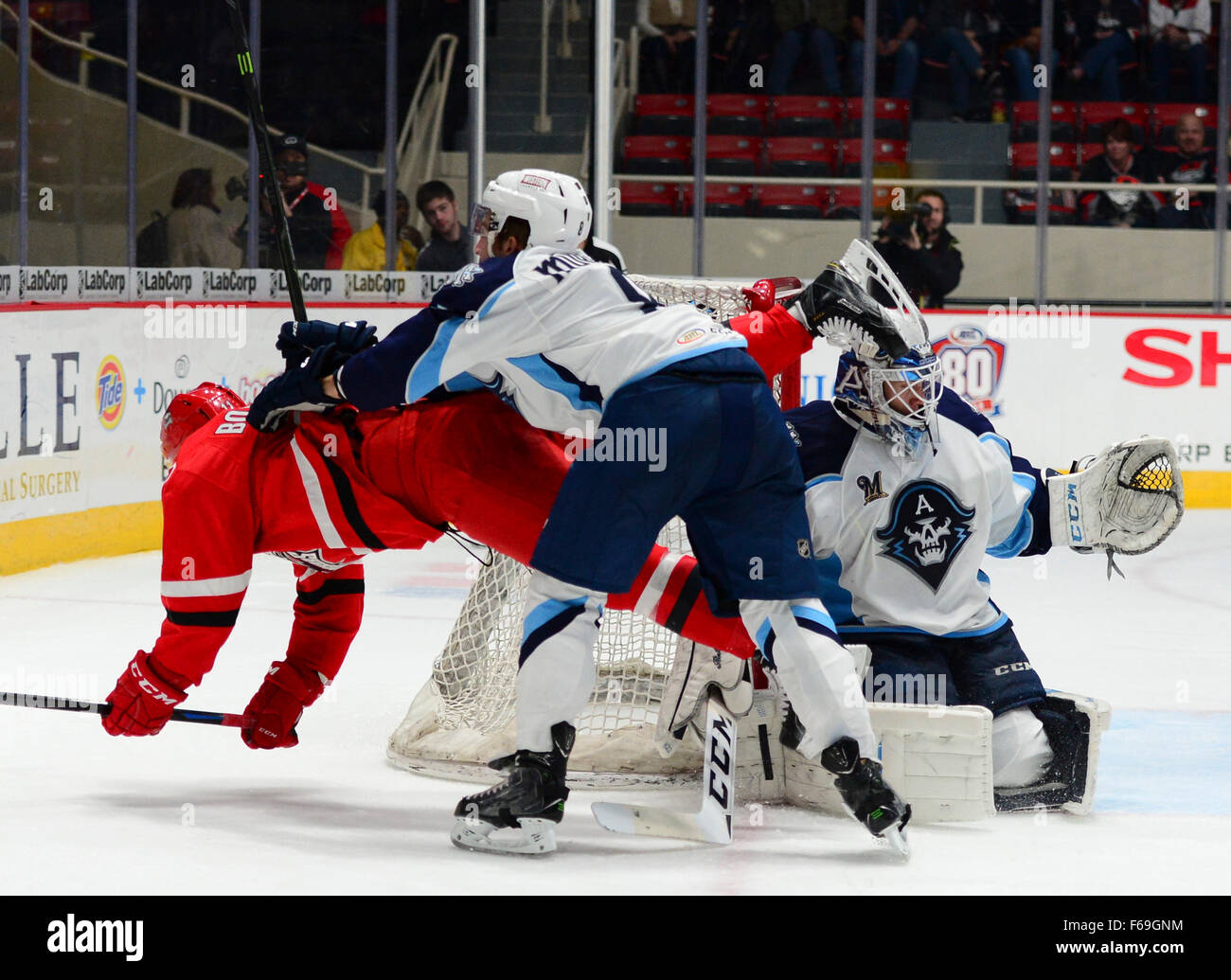 Charlotte Checkers Forward Zach Boychuk (11) is hit from behind during ...