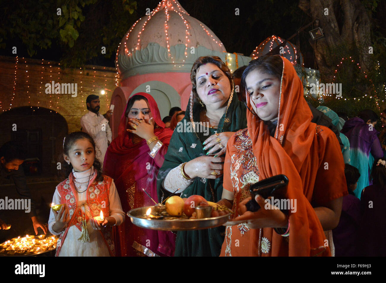 Peshawar. 14th Nov, 2015. Pakistani Hindu devotees pray during a ...