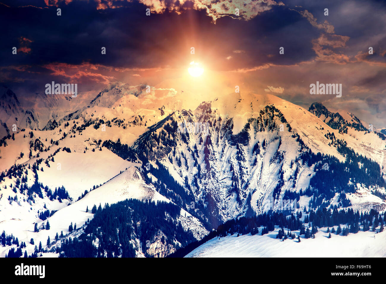 Sun in mountains on cloud sky background Stock Photo - Alamy