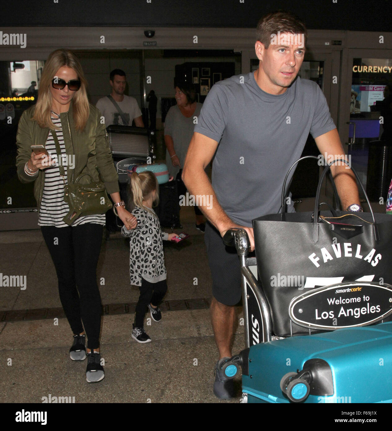 Steven Gerrard and his family arrive at Los Angeles International (LAX ...