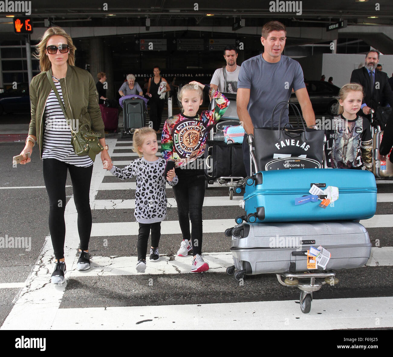 Steven Gerrard and his family arrive at Los Angeles International (LAX ...