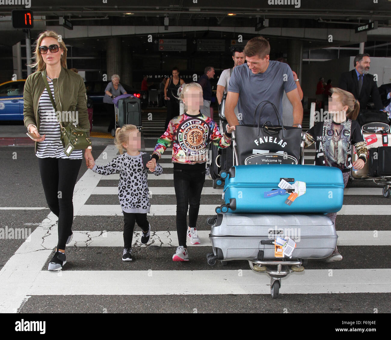 Steven Gerrard and his family arrive at Los Angeles International (LAX ...
