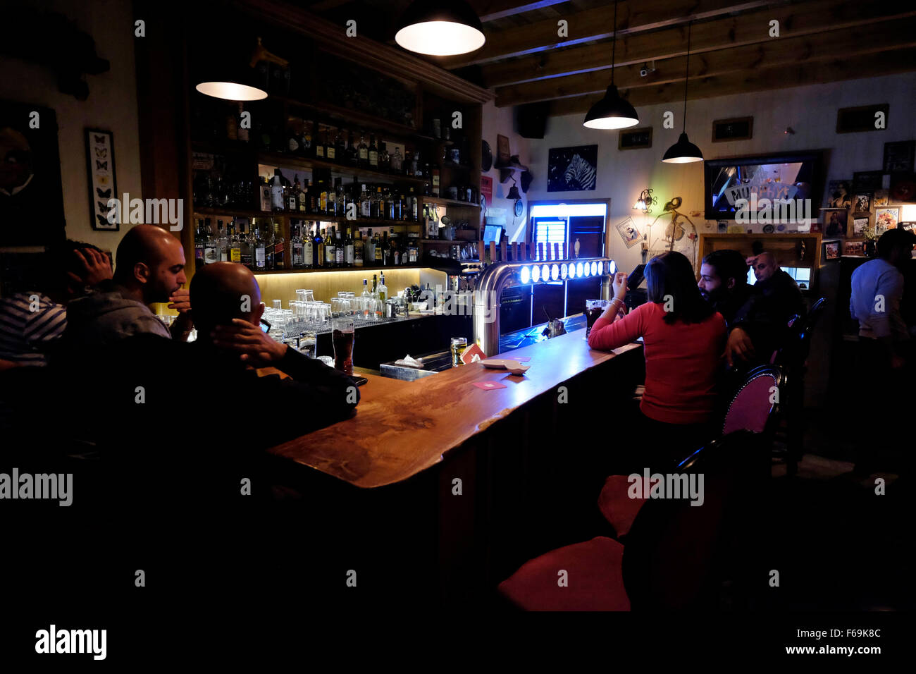 Christian Arab-Israeli drinking beers in the Arab Christian Kamun bar ...