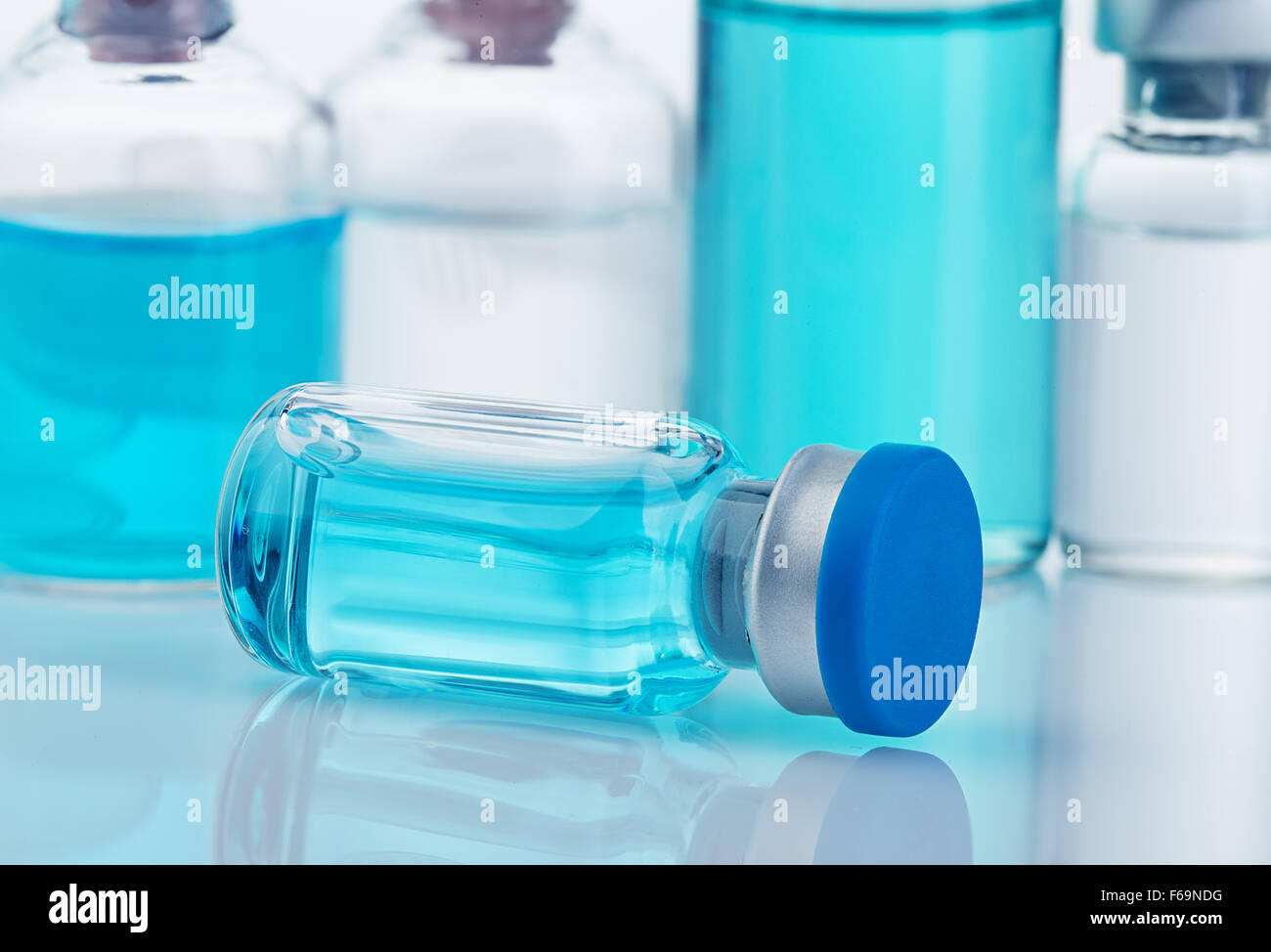 Vial with blue solution close-up Stock Photo - Alamy