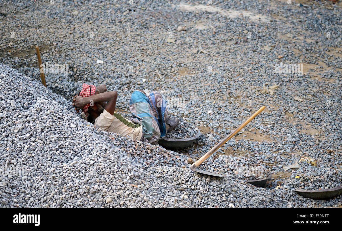 Manual worker resting Stock Photo - Alamy