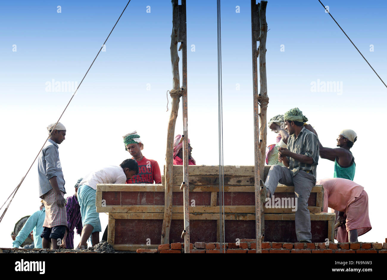 Construction site- Manual worker working Stock Photo - Alamy