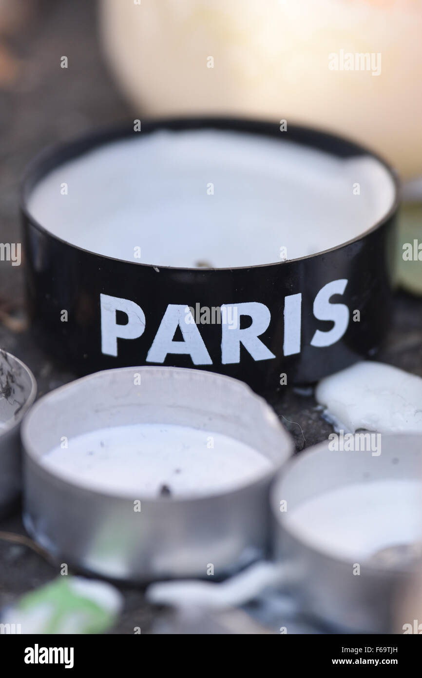 A candle with the word 'PARIS' stands in a shut off zone at the ...