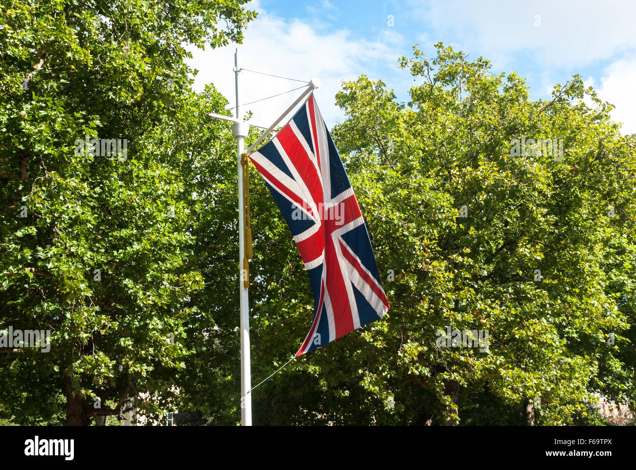 Union Jack flying on the London street Stock Photo - Alamy