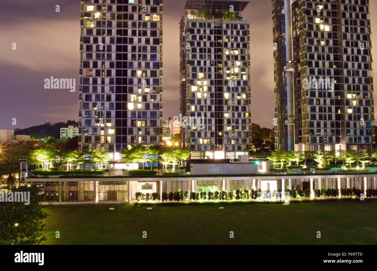 A Modern architect of multistory building with greenery covered Stock ...